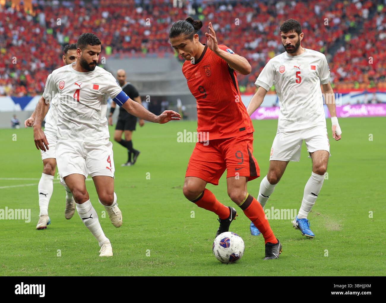 Chongqing, China. 10th June, 2025. Zhang Yuning (C) of China vies with ...