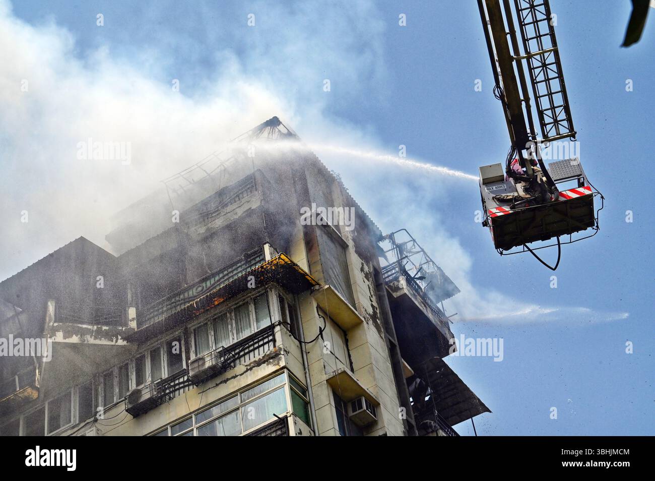 NEW DELHI, INDIA - JUNE 10: Fire tenders douse the fire on the 10th ...