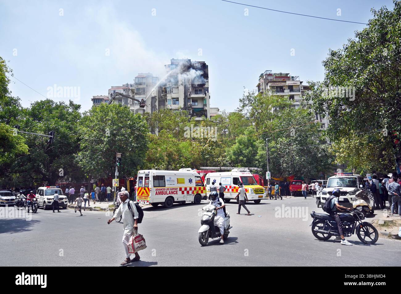 NEW DELHI, INDIA - JUNE 10: Fire tenders douse the fire on the 10th ...