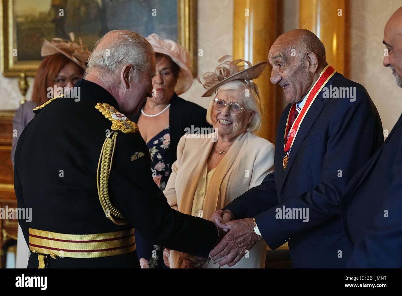 Rugby league star Billy Boston being Knighted by King Charles III at ...