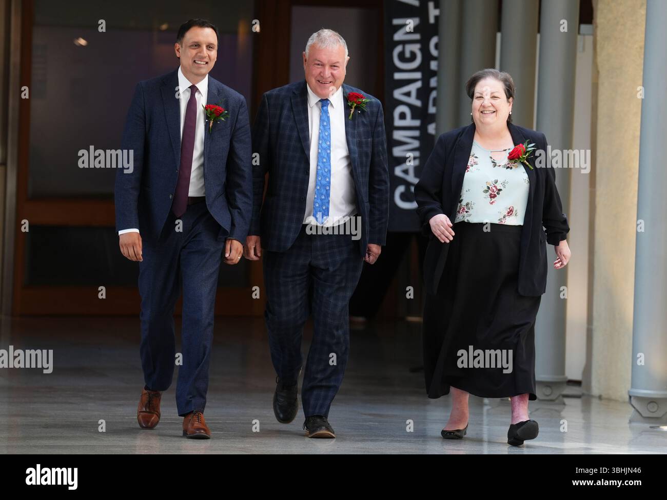 Scottish Labour leader Anas Sarwar and newly elected MSP Davy Russell ...
