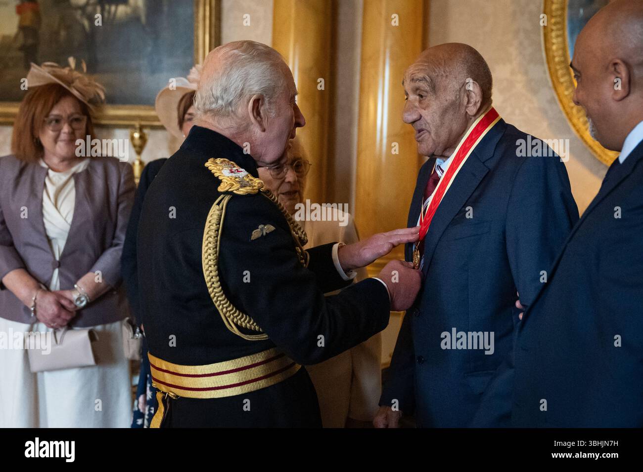 Rugby league star Billy Boston being Knighted by King Charles III at ...