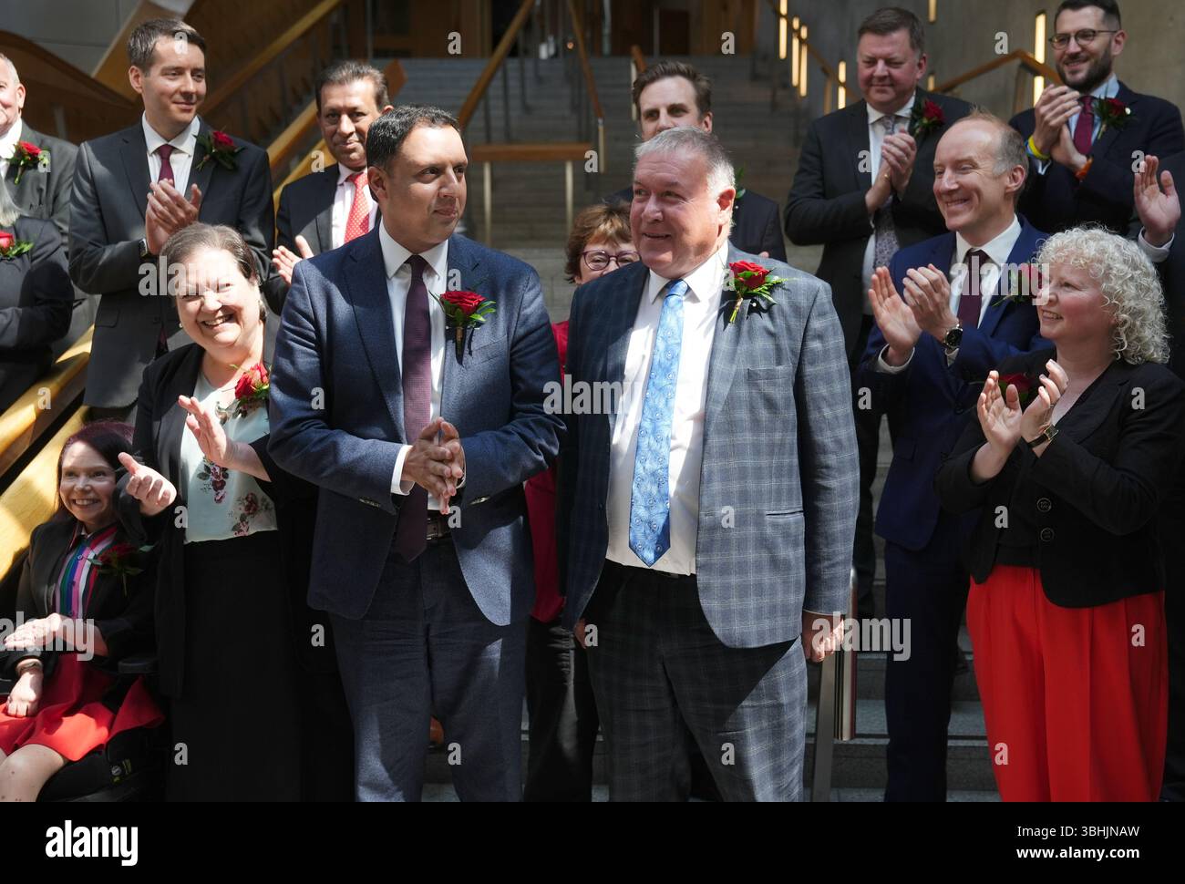 Scottish Labour leader Anas Sarwar and newly elected MSP Davy Russell ...