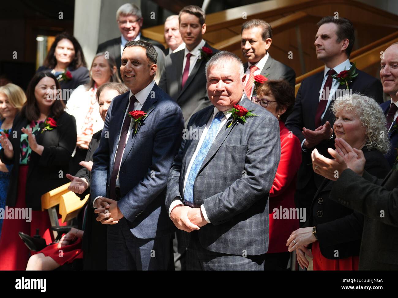 Scottish Labour leader Anas Sarwar and newly elected MSP Davy Russell ...