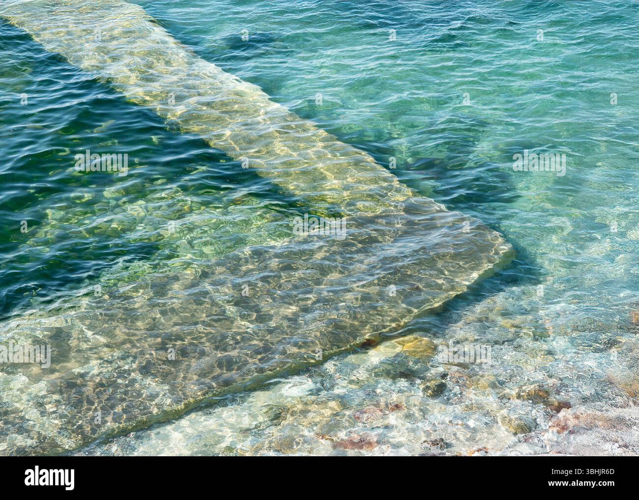 Abstract Devil’s Point swimming pool on the seafront in Stonehouse ...
