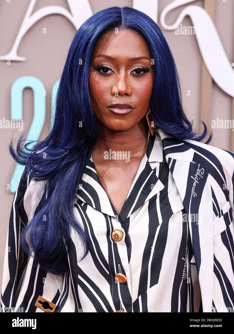 LOS ANGELES, CALIFORNIA, USA - JUNE 09: Muni Long arrives at the BET ...