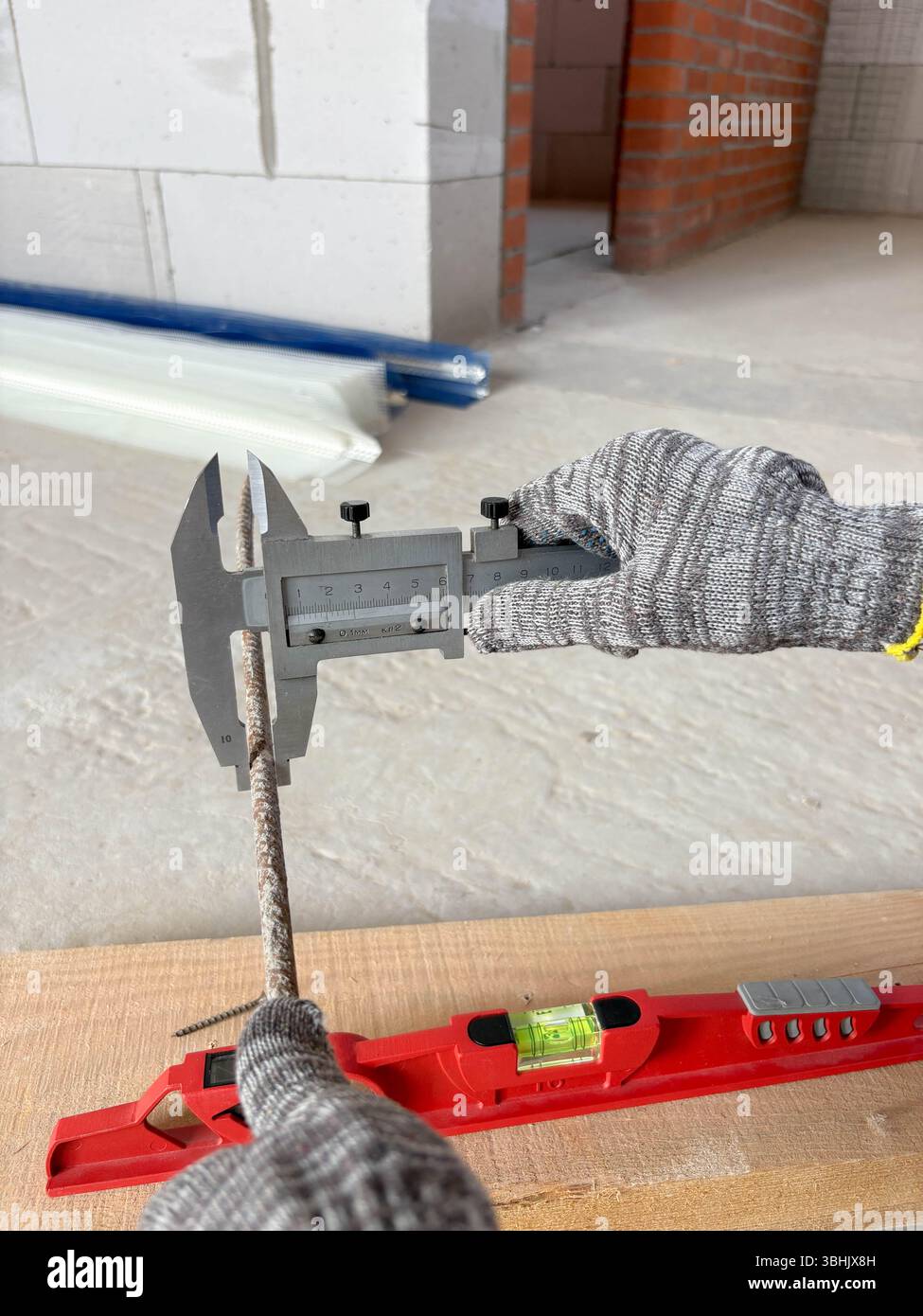 Measuring the diameter of reinforcement using a caliper. Work process ...