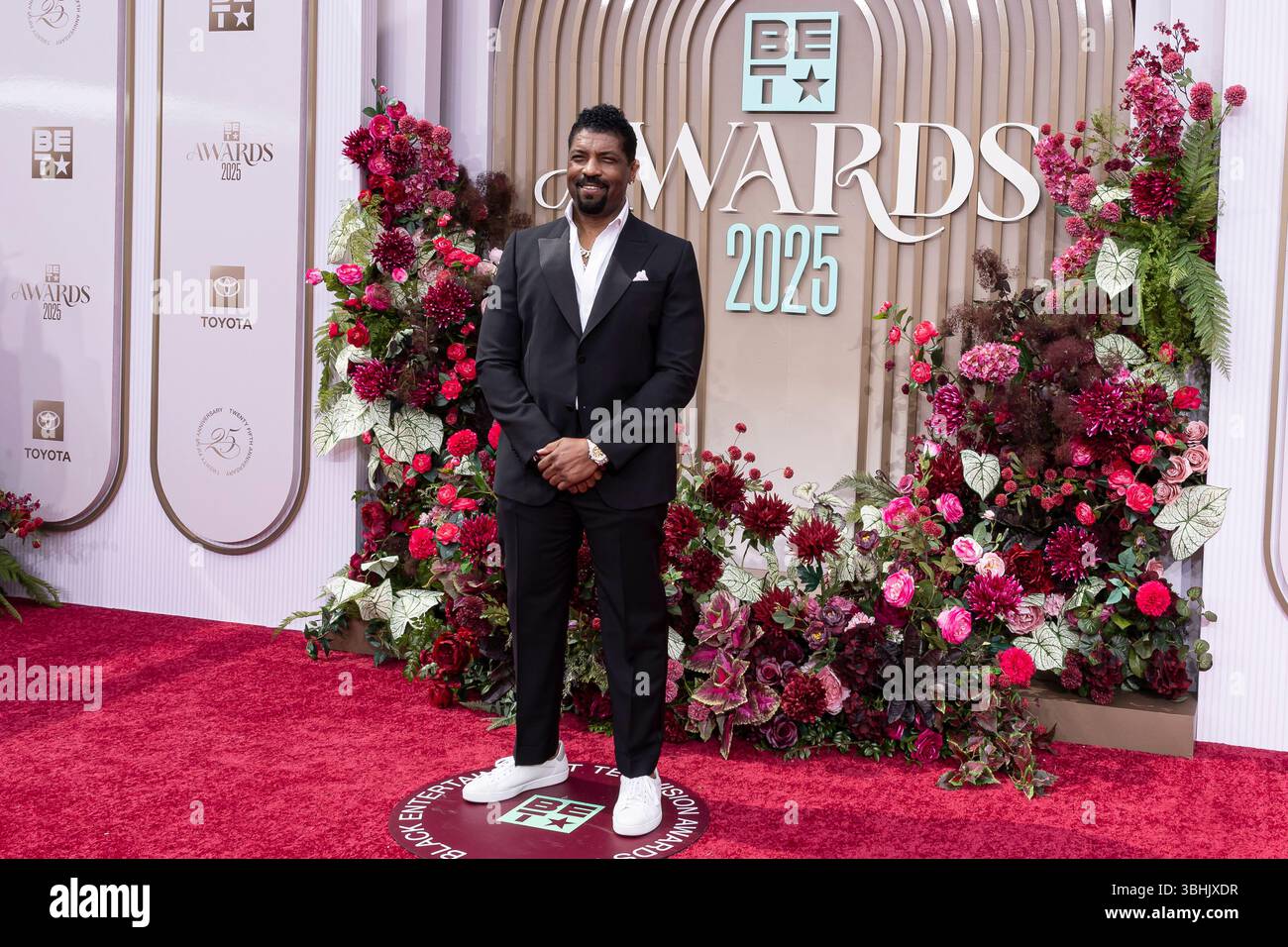 Deon Cole attends the arrivals of the “BET Awards 2025” at the Peacock ...