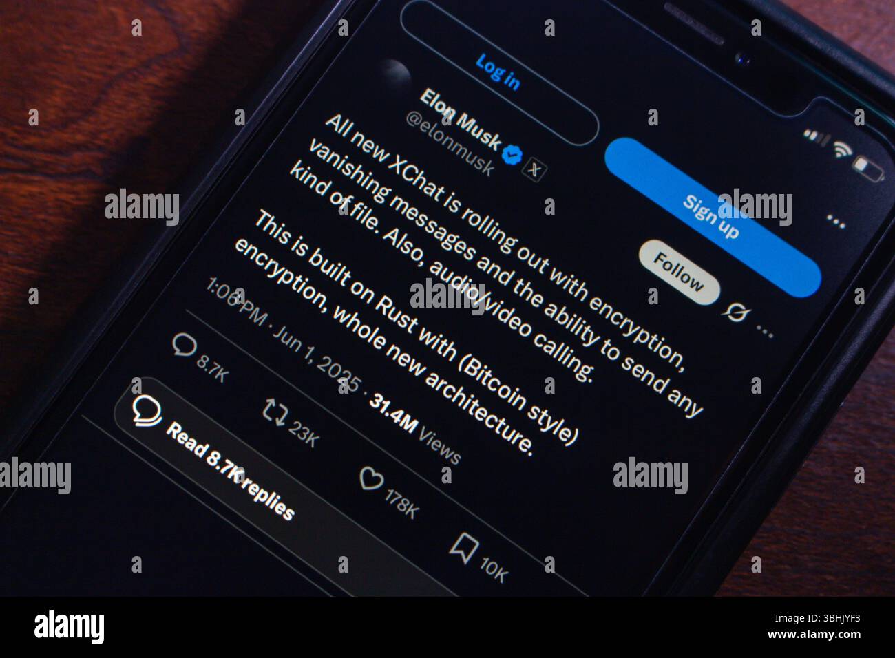 Smartphone screen showing Elon Musk's tweet announcing new XChat ...