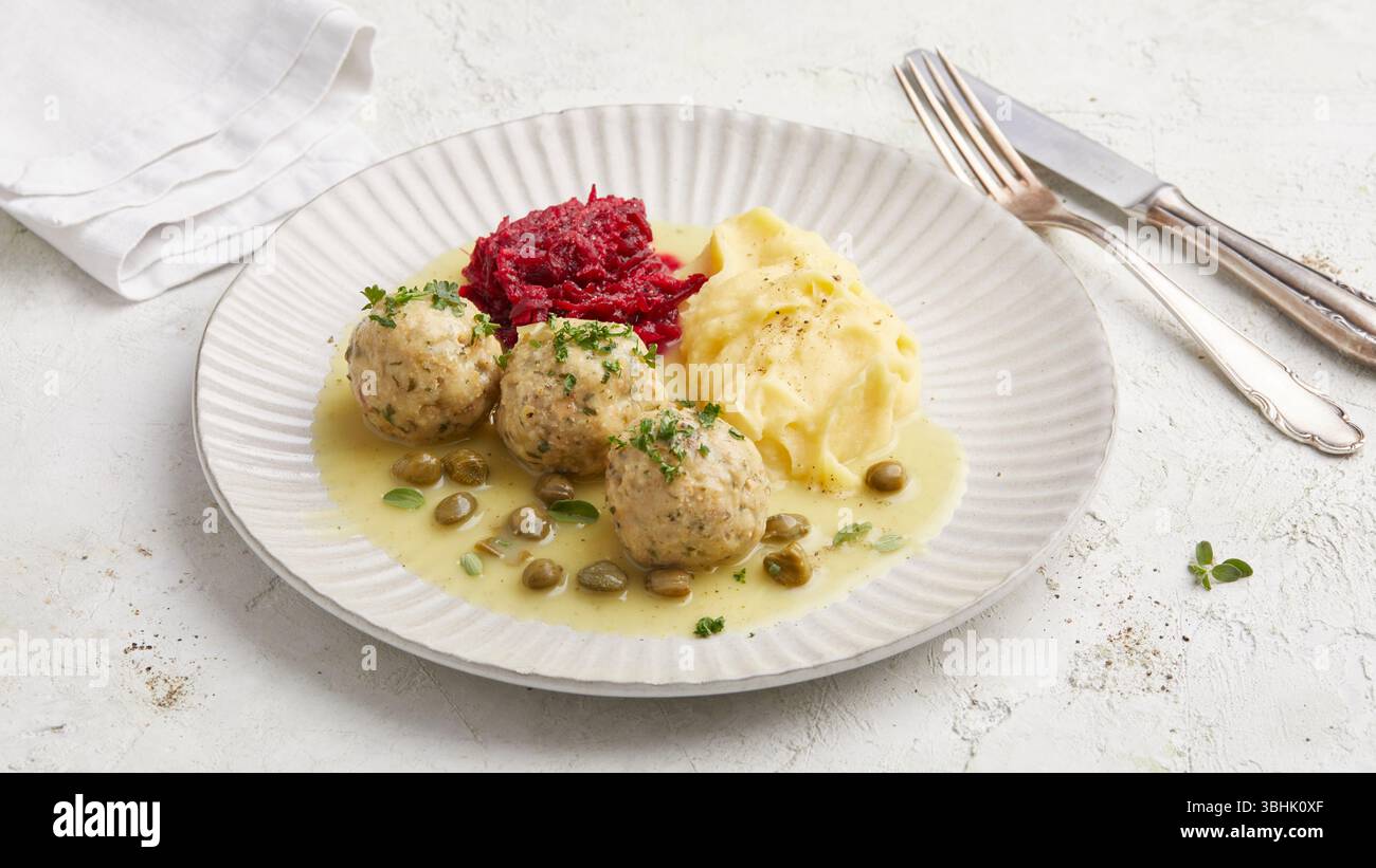 German meatballs in creamy caper sauce. Traditional German meatballs ...