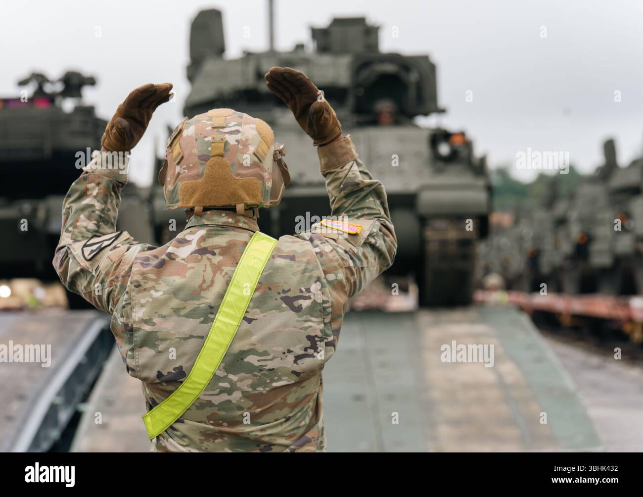 A U.S. Army Soldier assigned to 1st Cavalry Division, ground guides an ...