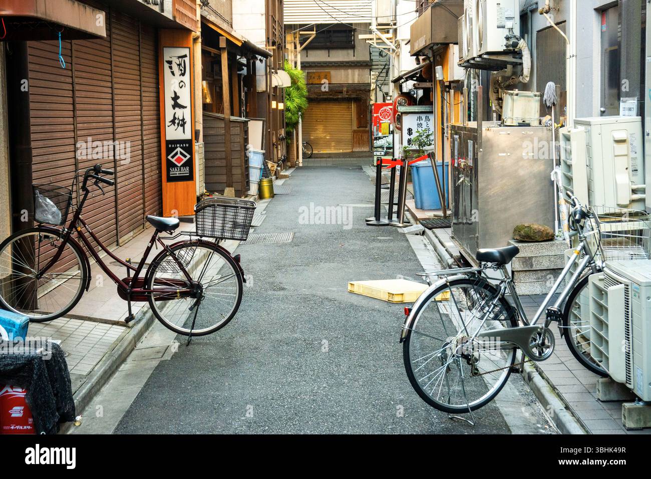 alley way behind restaurants in the Asakusa neighborhood of Tokyo Japan ...