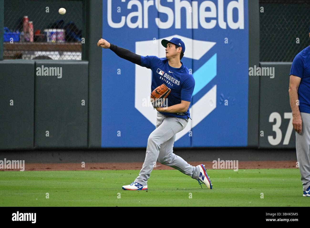Los Angeles Dodgers' Shohei Ohtani throws prior to a baseball game ...