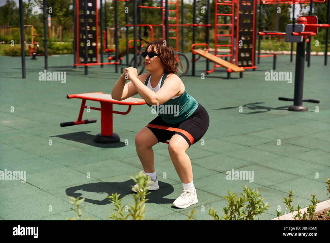 Young woman performs resistance hi-res stock photography and images - Alamy