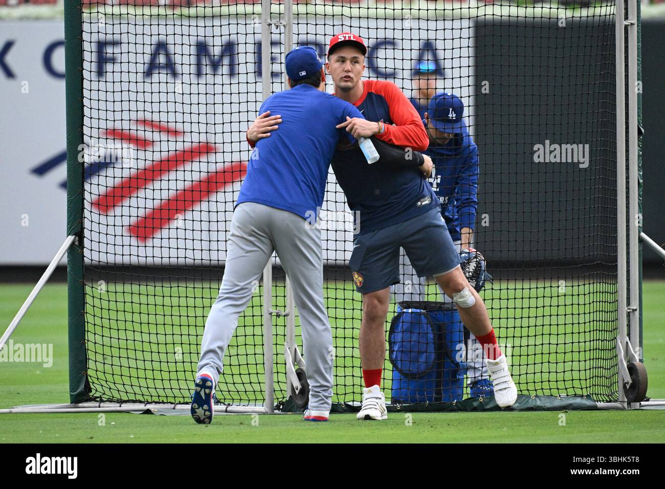 Los Angeles Dodgers' Shohei Ohtani, left, hugs St. Louis Cardinals ...