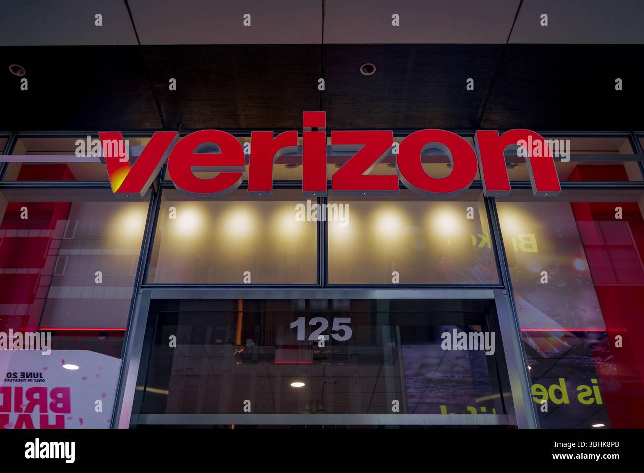 USA. 09th June, 2025. Sign at the entrance to a Verizon store in ...