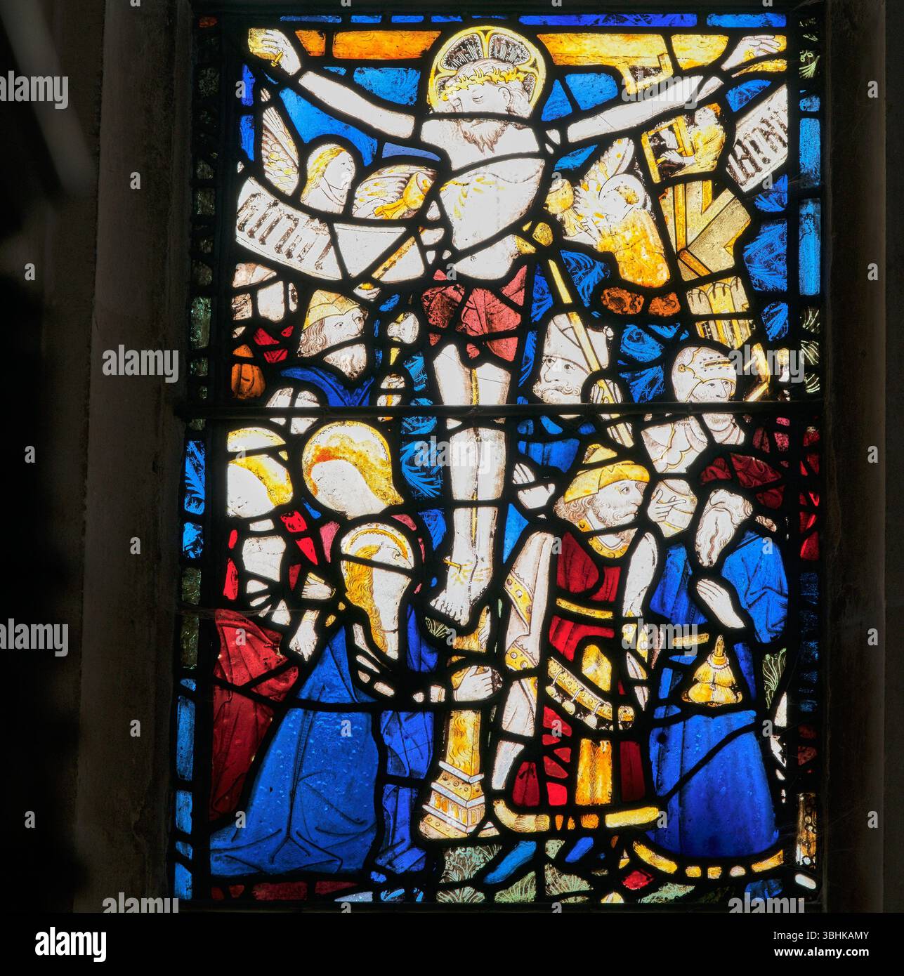 Medieval stained-glass window, of the crucifixion of Jesus Christ, in ...