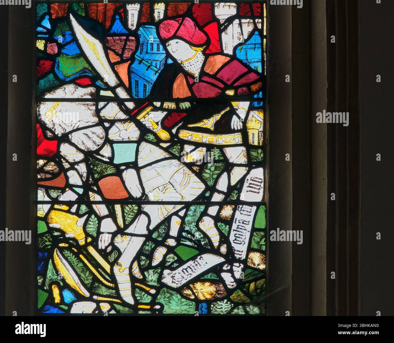 Medieval stained-glass window, of David killing Goliath, in St Martin's ...