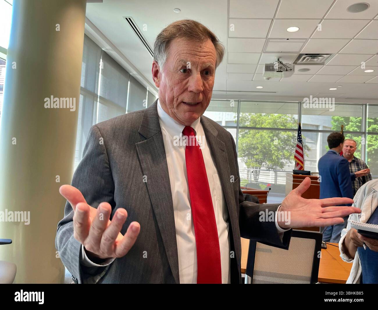 FILE - North Carolina Insurance Commissioner Mike Causey talks to ...