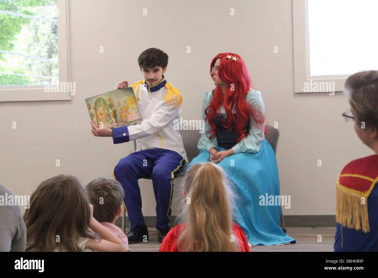 Shine the Light students dressed as Disney's Ariel and Prince Eric read ...