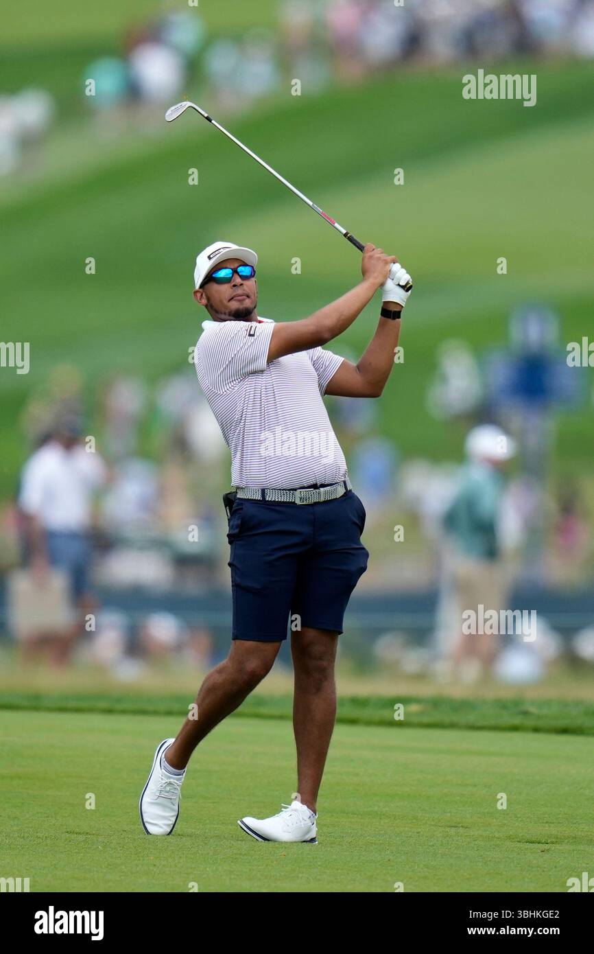 Chase Johnson hits from the fifth fairway during a practice round ahead ...
