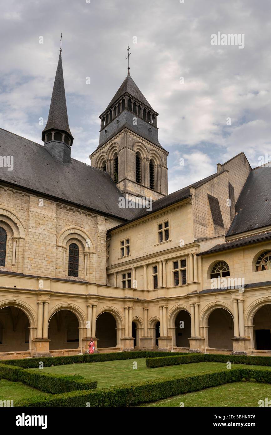 Majestic Romanesque abbey church displays twin spires and classic ...