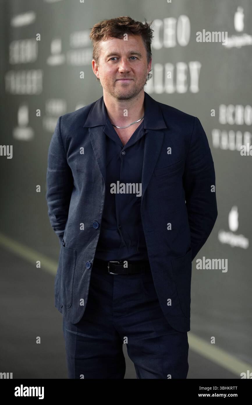 Director Michael Pearce poses for photographers upon arrival at the ...