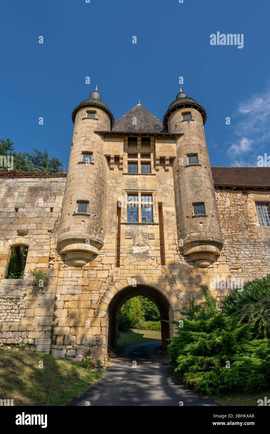 Medieval castle gatehouse with twin towers and stone archway entrance ...