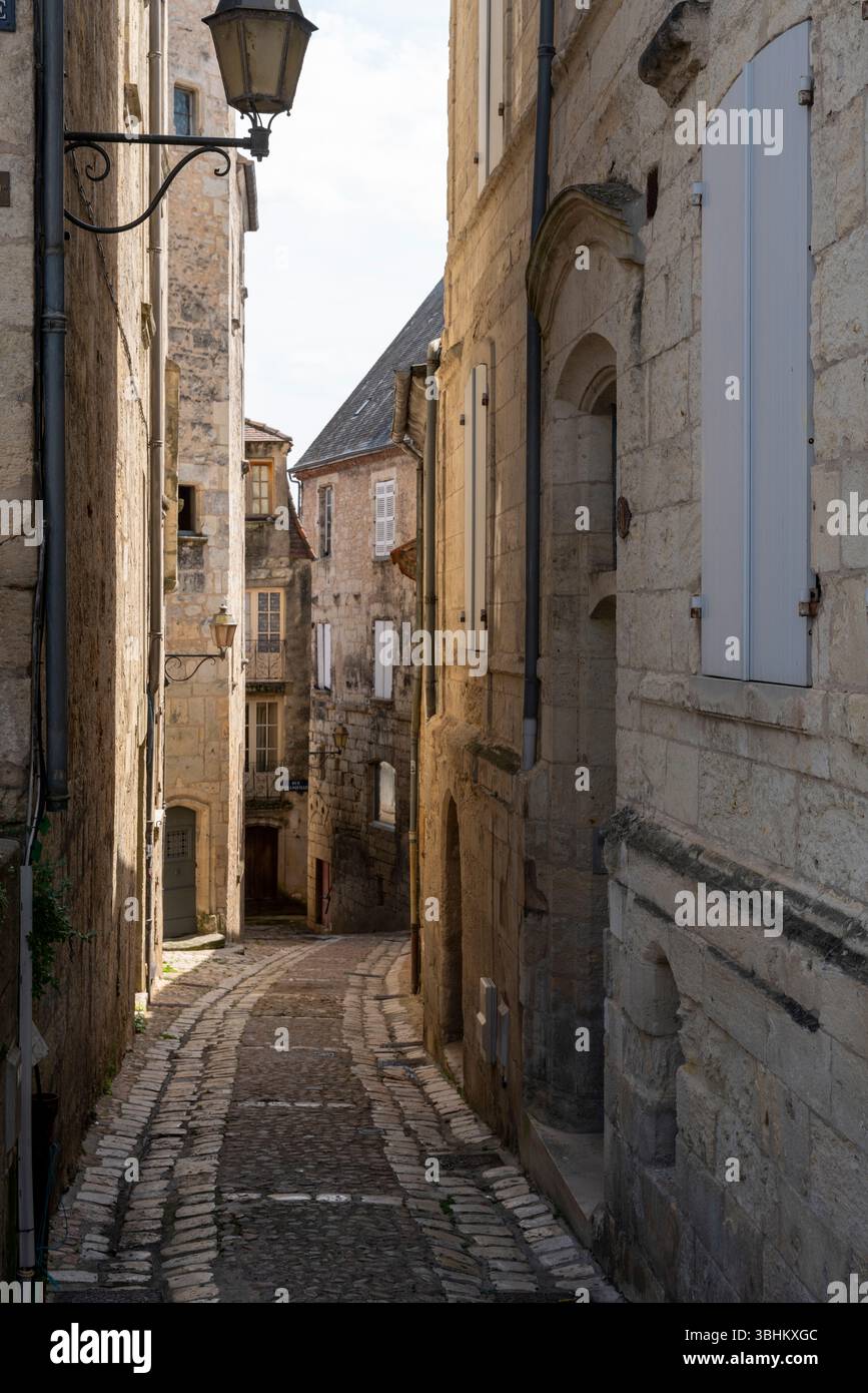 Medieval stone architecture with arched doorways and historic building ...