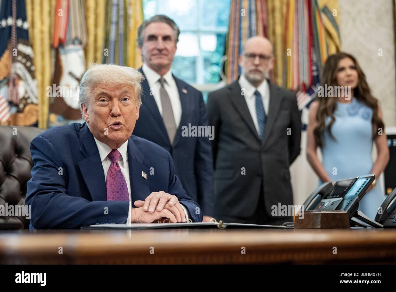 U.S. President Donald Trump speaks in the Oval Office at the White ...