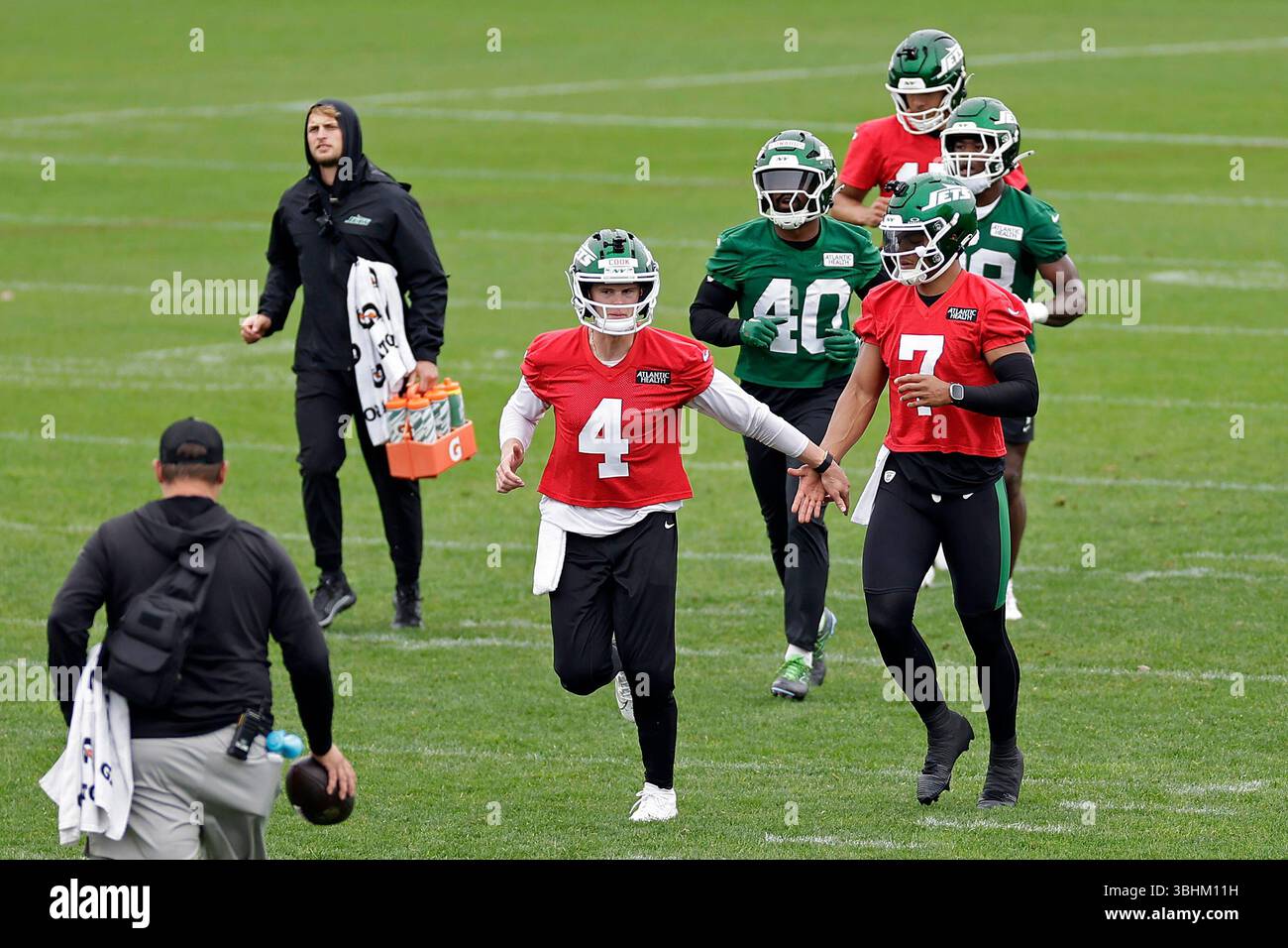 New York Jets quarterback Justin Fields (7) with Brady Cook (4) during ...