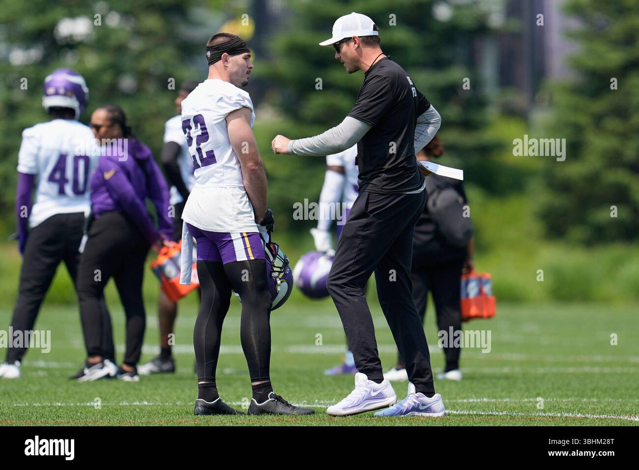 Minnesota Vikings safety Harrison Smith (22) and head coach Kevin O ...