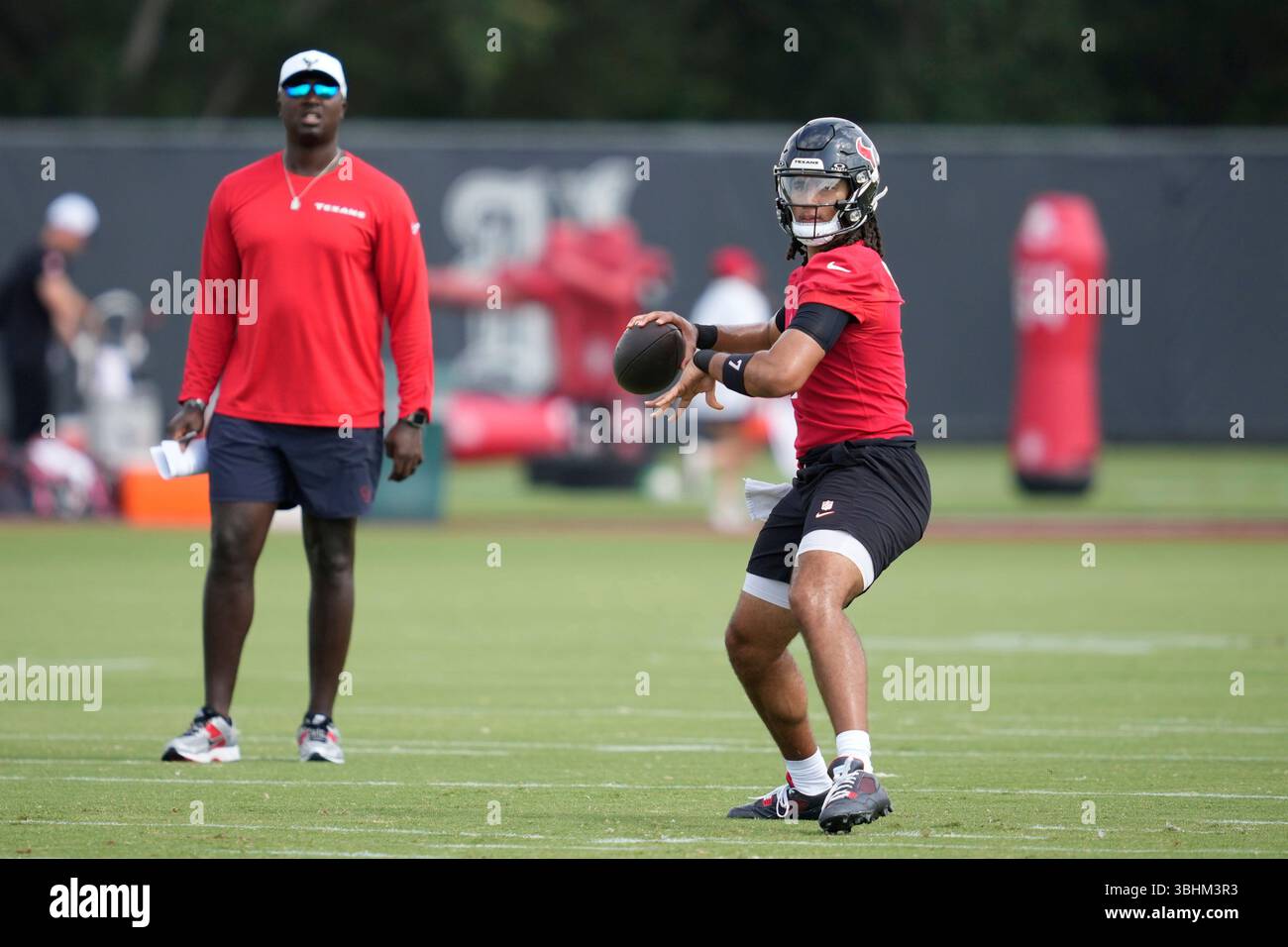 Houston Texans quarterback C.J. Stroud (7) works out with wide receiver ...