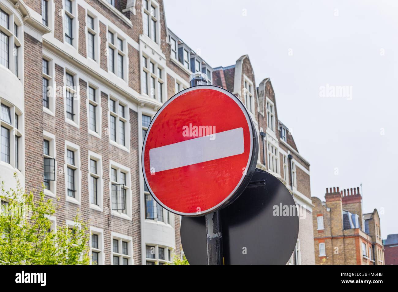 Red No Entry Road Sign on Urban Street Lined with Classic Historic ...
