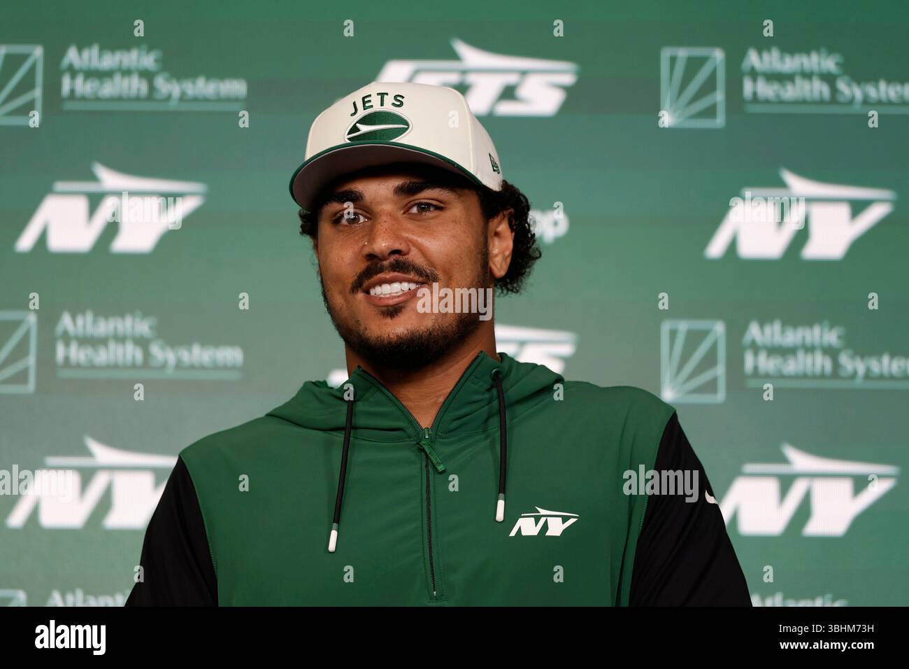 New York Jets defensive lineman Rashad Weaver speaks to the media after ...