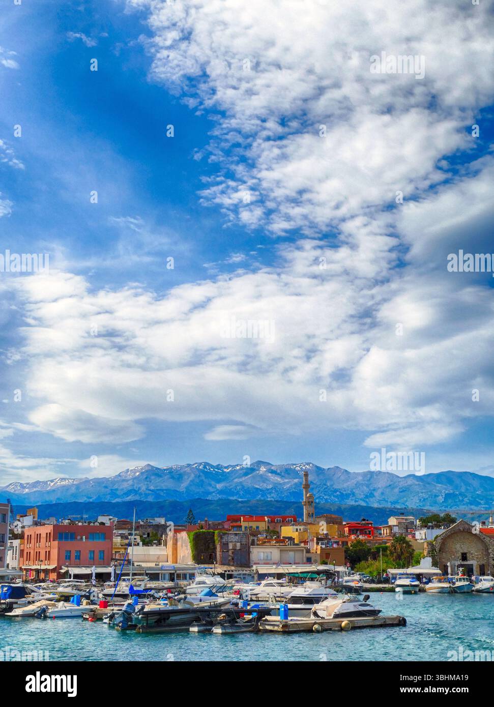 CHANIA, CRETE - MAY 5, 2025 - Venetian harbour with moored boats and ...