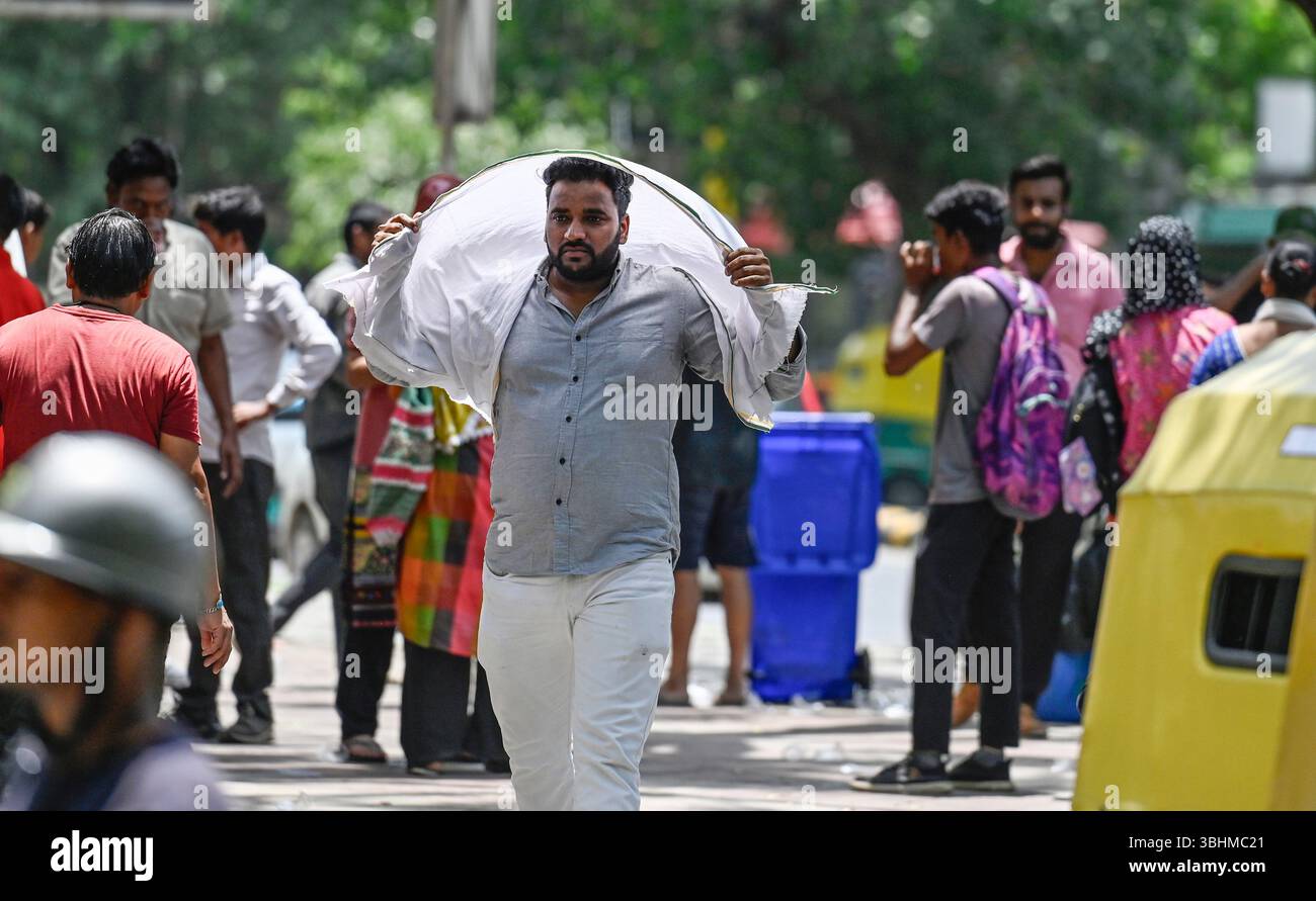 NEW DELHI, INDIA - JUNE 10: People seen out on a hot day at Janpath in ...