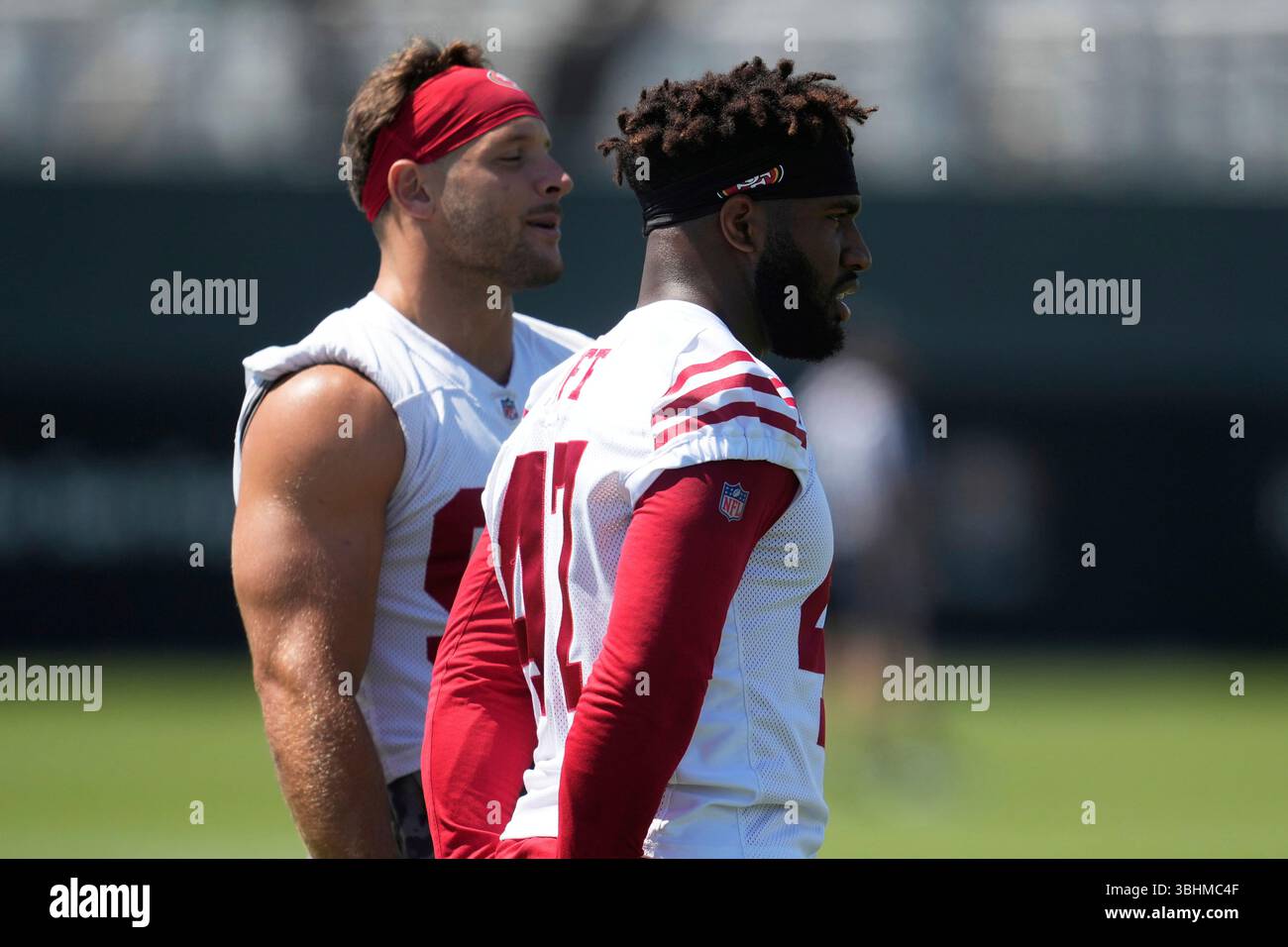 San Francisco 49ers defensive end Nick Bosa, left, and defensive ...