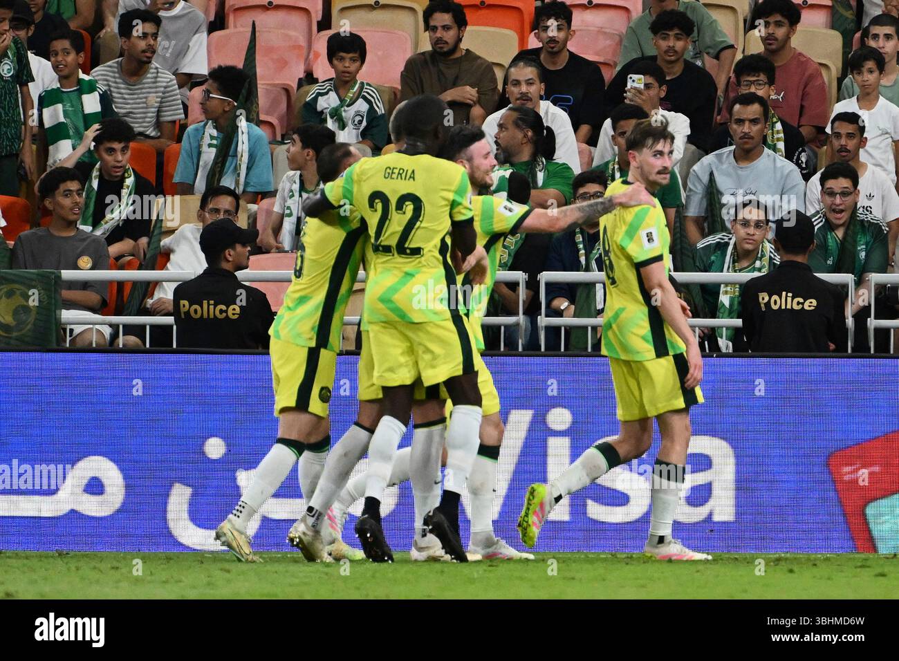 Australia's Connor Metcalfe, right, celebrates after scoring his side's ...