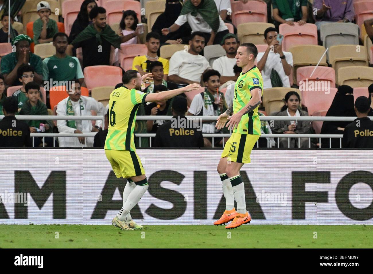 Australia's Mitchell Duke, right, celebrates after scoring his side's ...