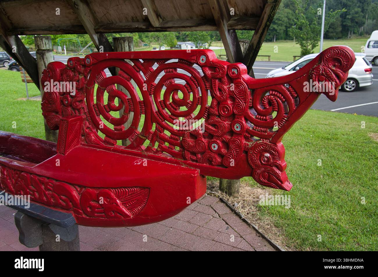 Detail of a carved decoration, part of a wooden Maori waka (canoe) in ...