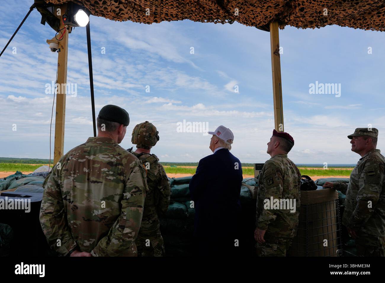 President Donald Trump observes military demonstrations at Fort Bragg ...