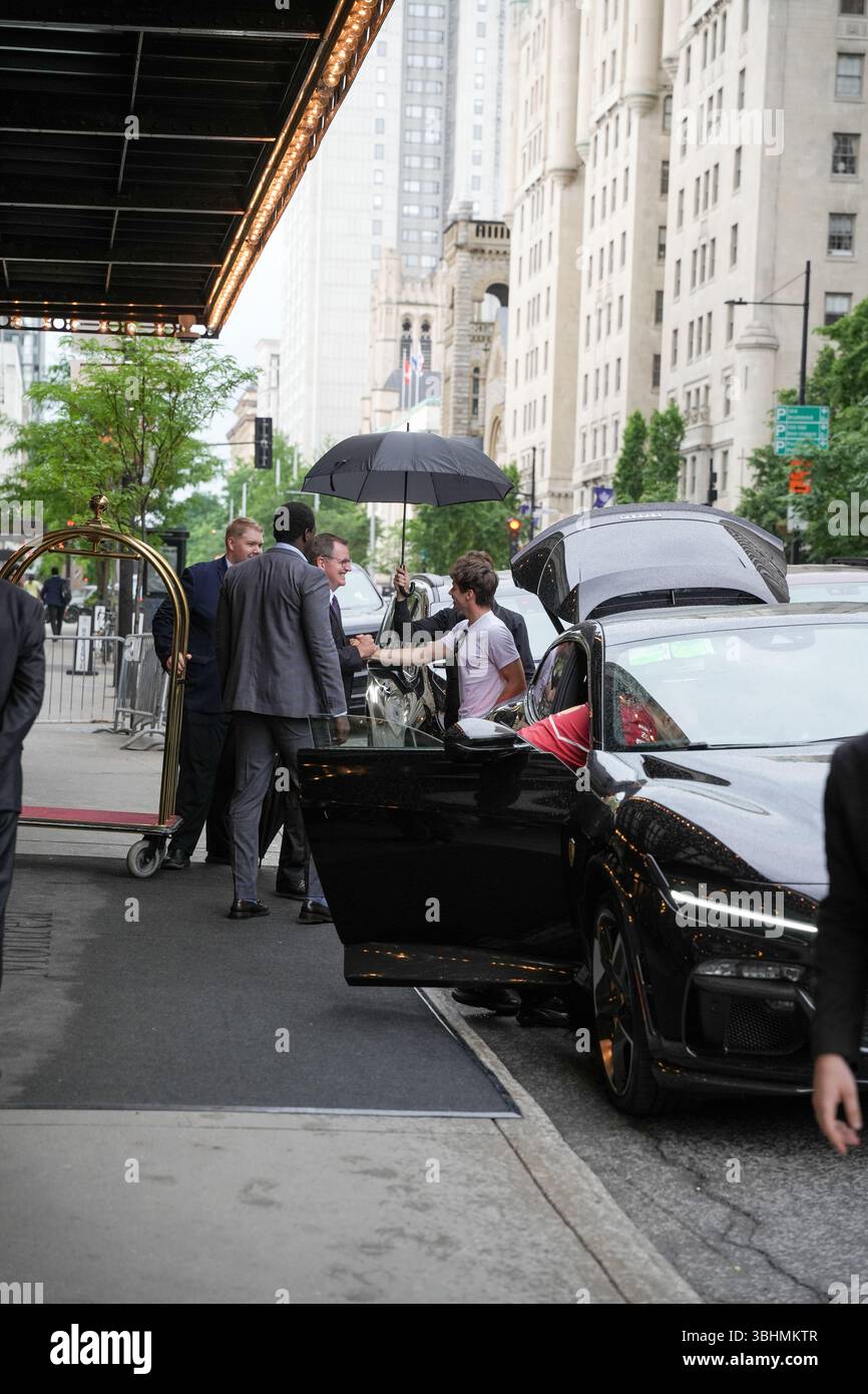 Charles Leclerc arrives at the Ritz-Carlton Montreal in a black Ferrari ...
