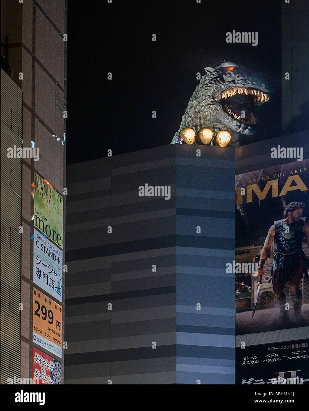 Godzilla head tourist attraction on top of a building in Kabukicho ...