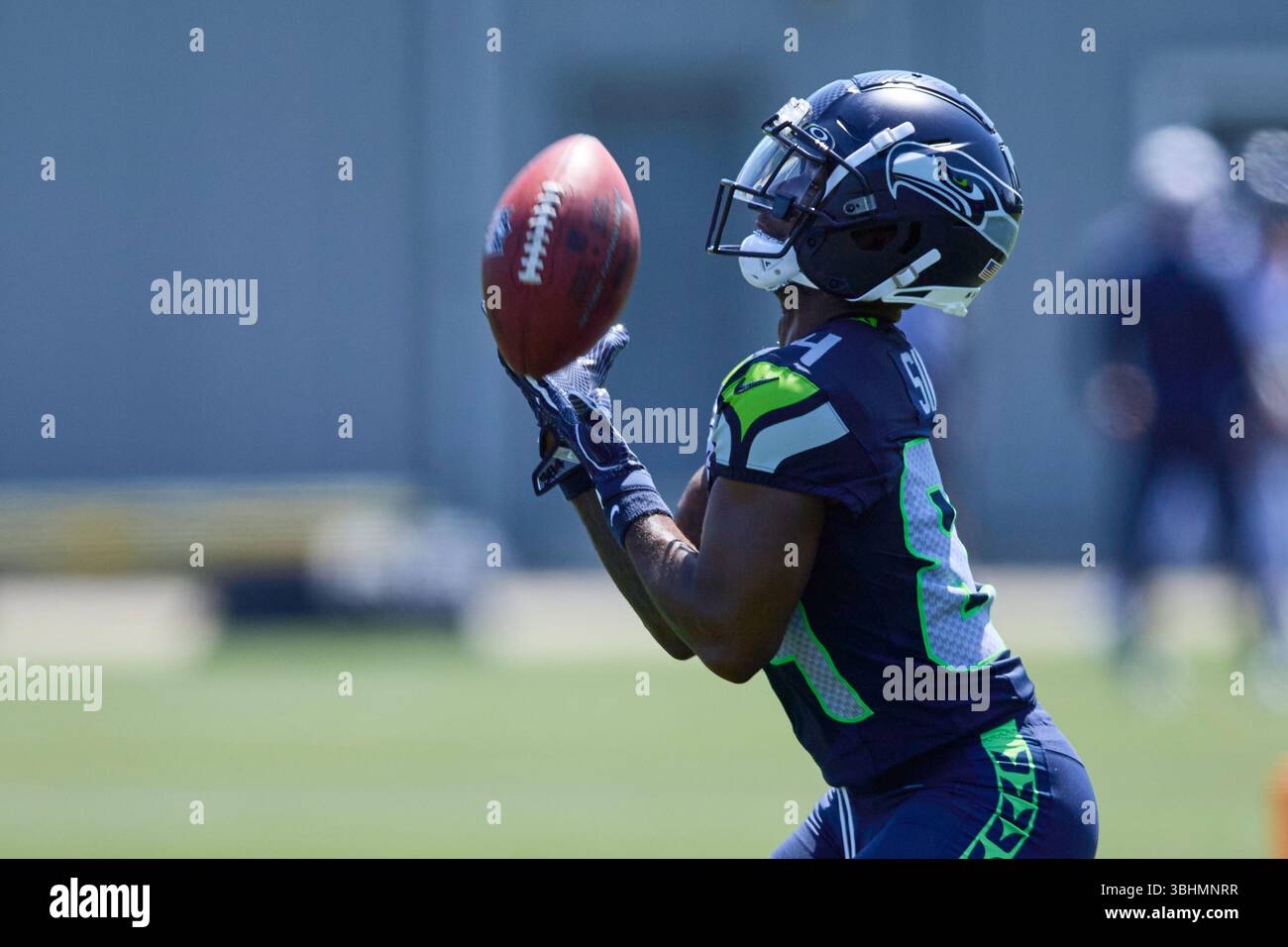 Seattle Seahawks wide receiver Steven Sims reaches for the ball during ...