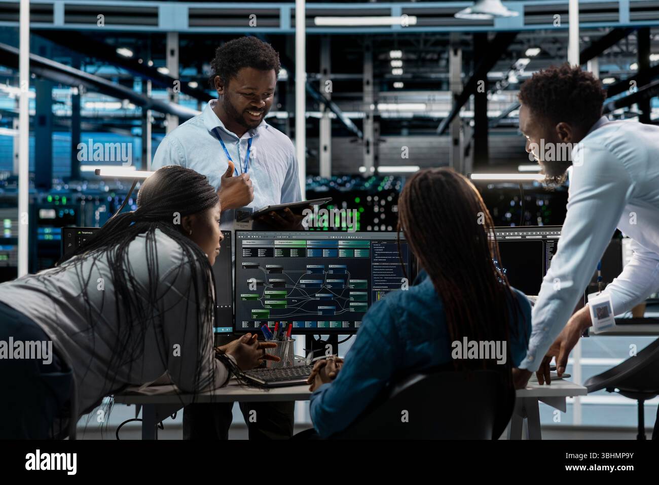 Engineering team programming in AI data center housing advanced ...