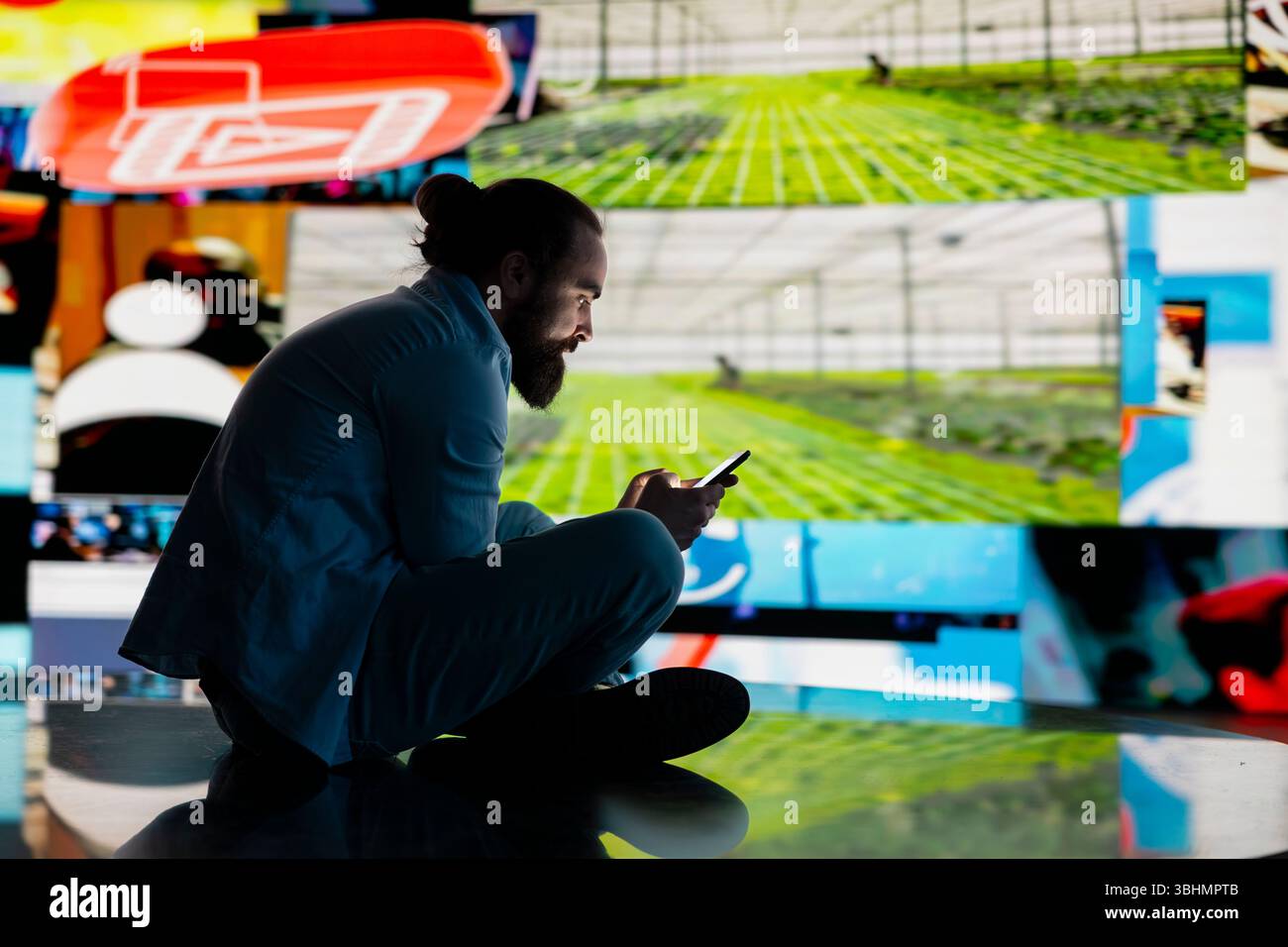 Stressed individual obsessively overuses his mobile phone social ...