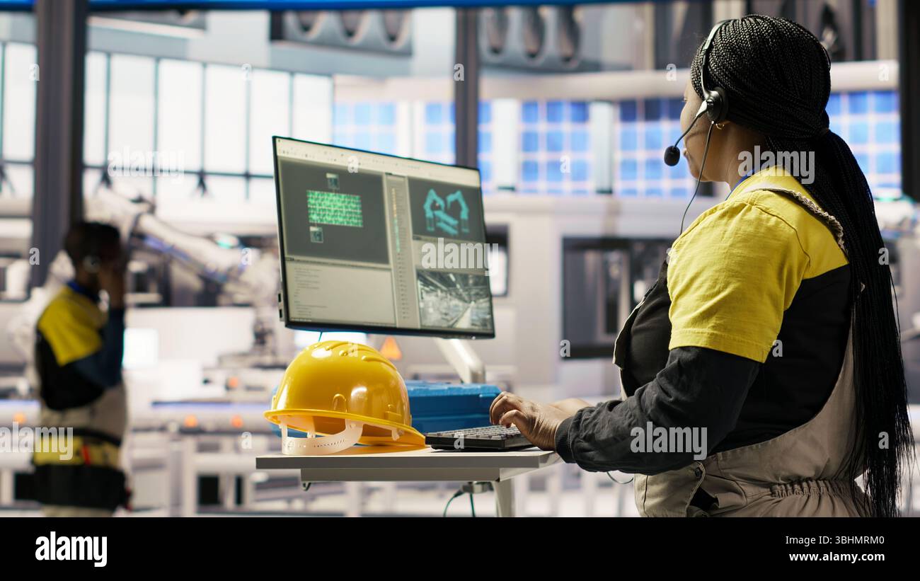 Technician remotely supervising smart factory hi-res stock photography ...