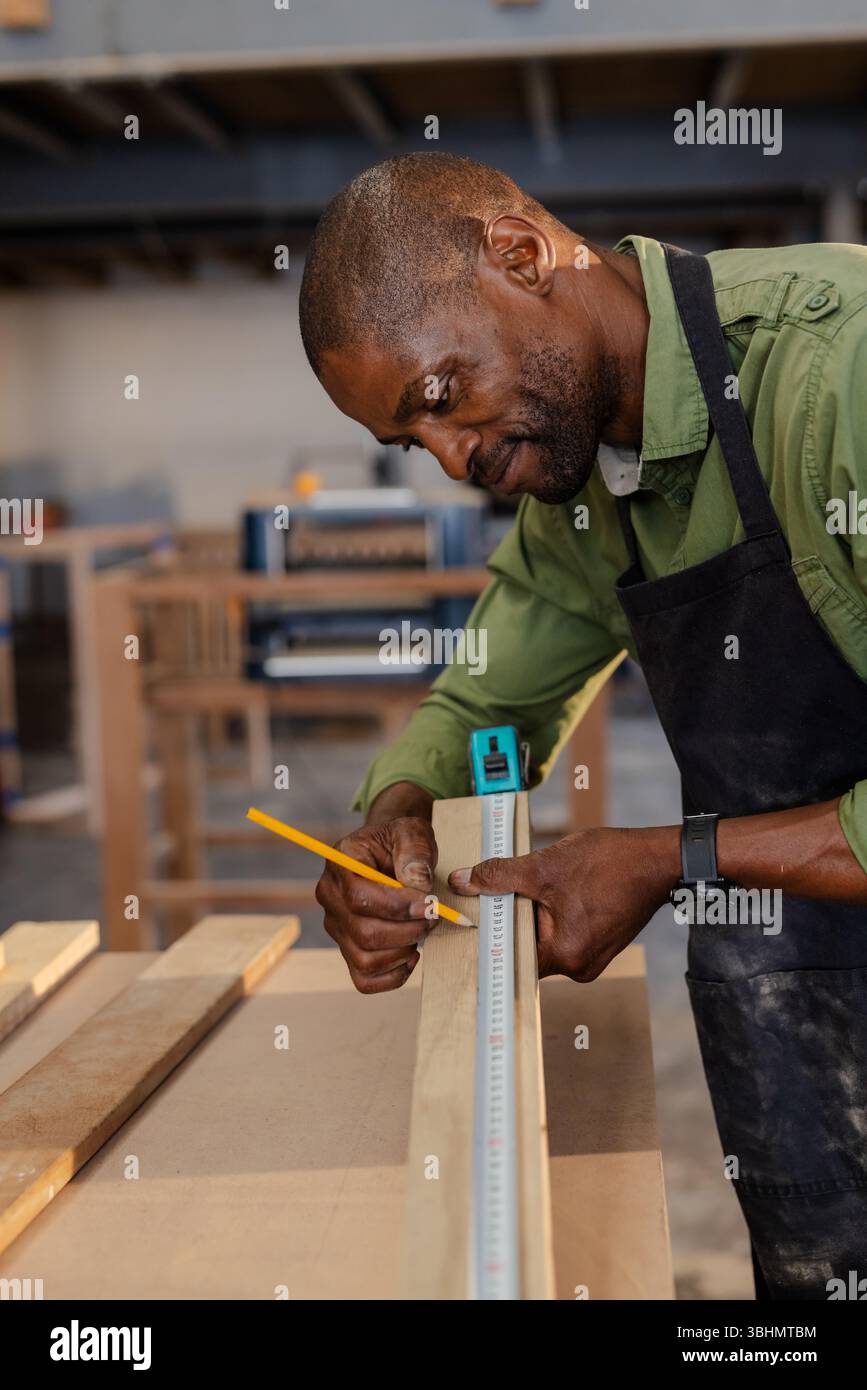 Professional carpenter using pencil metal hi-res stock photography and ...
