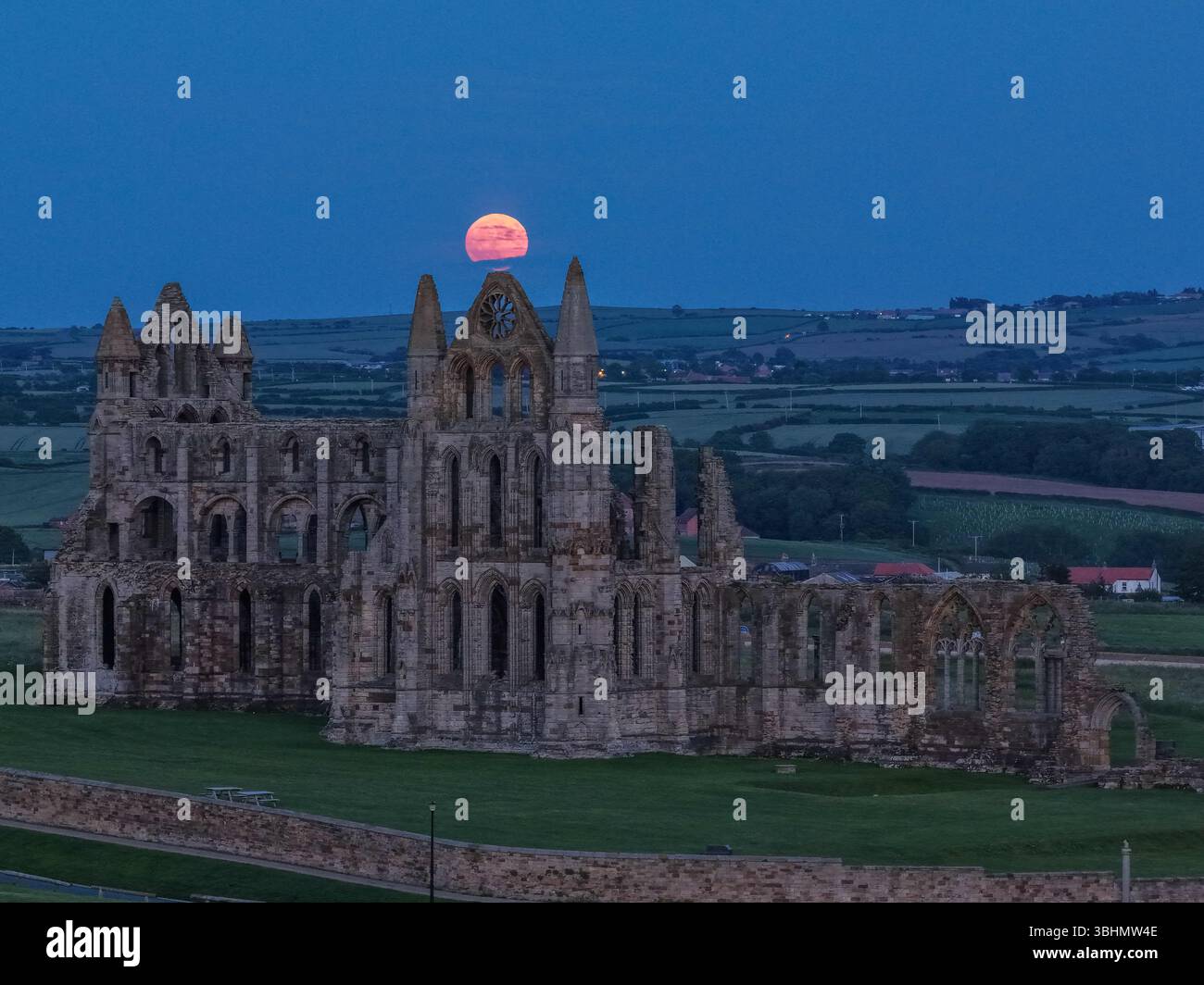 June's rare Strawberry Moon rises over Whitby Abbey and Harbour, Whitby ...